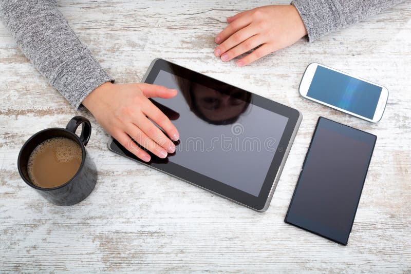 A woman`s hand at a table stock image. Image of touch - 104349615