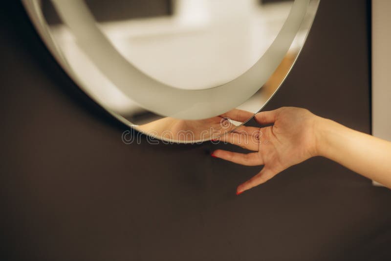Woman S Hand Turns Off the Backlight of the Bathroom Mirror by Touching ...