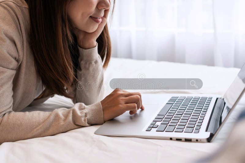 Woman`s Hand Using a Computer Notebook To Searching for Information ...