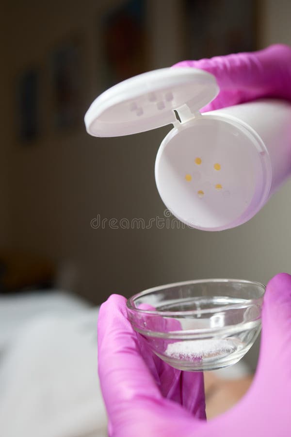 Woman S Hand Using Talcum Powder on Grey Background. Stock Image ...