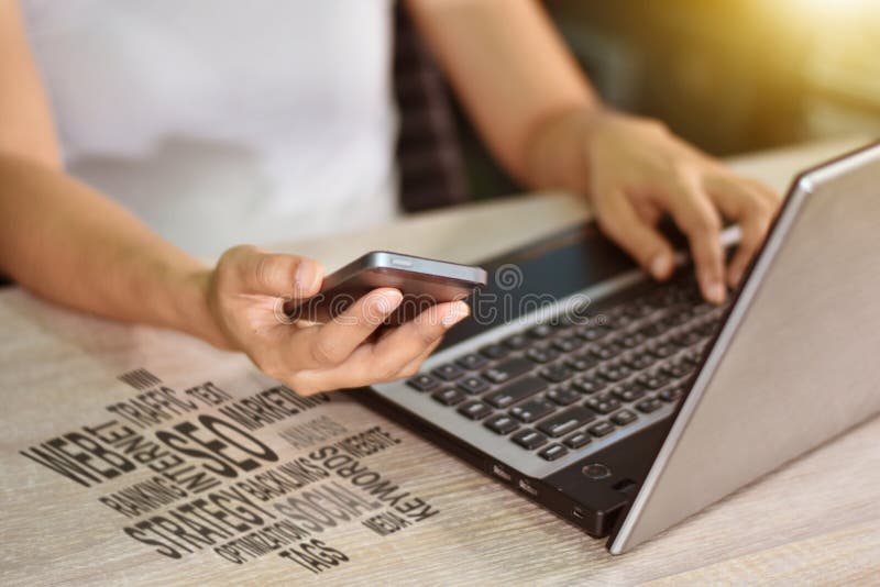 A Woman`s Hand Working on a Laptop Computer and Interactive Technology ...