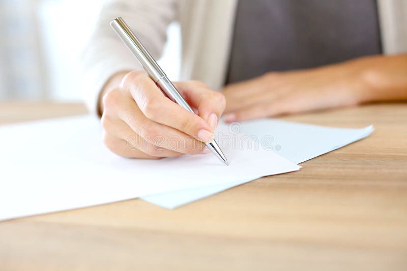 Woman s hand writing down stock photo. Image of office - 64673086