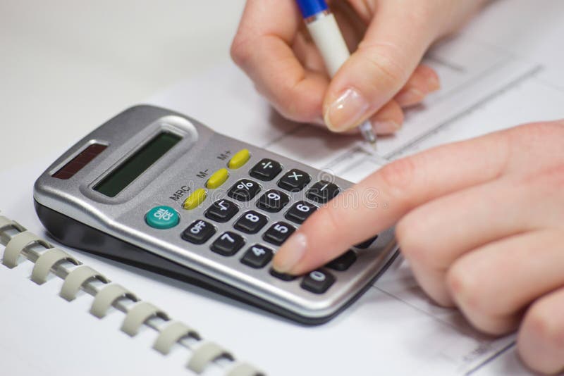 Woman S Hands Counting on Calculator Stock Photo - Image of plan ...