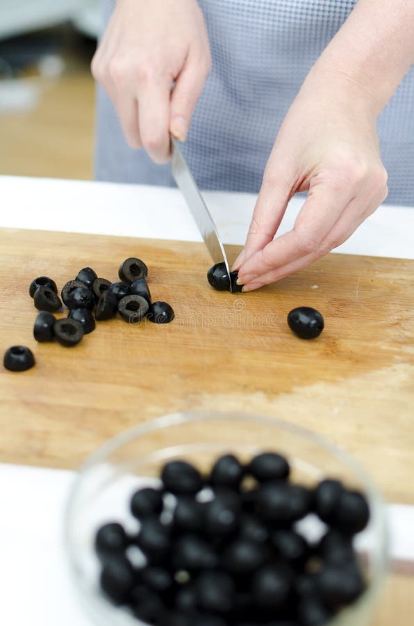 Woman S Hands Cutting Olives Stock Photo - Image of food, home: 22398194