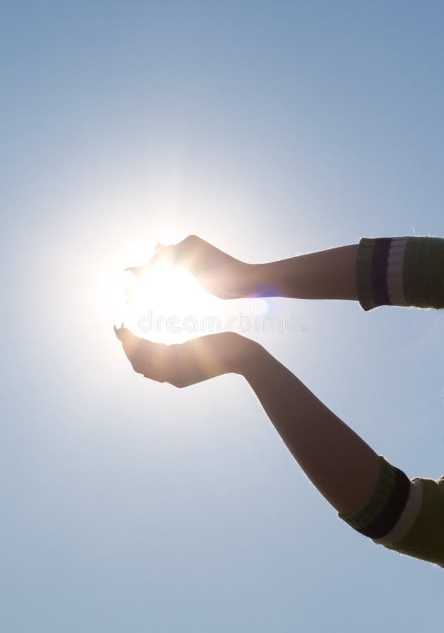 Woman s hands holding sun stock image. Image of glow, hope - 9312501