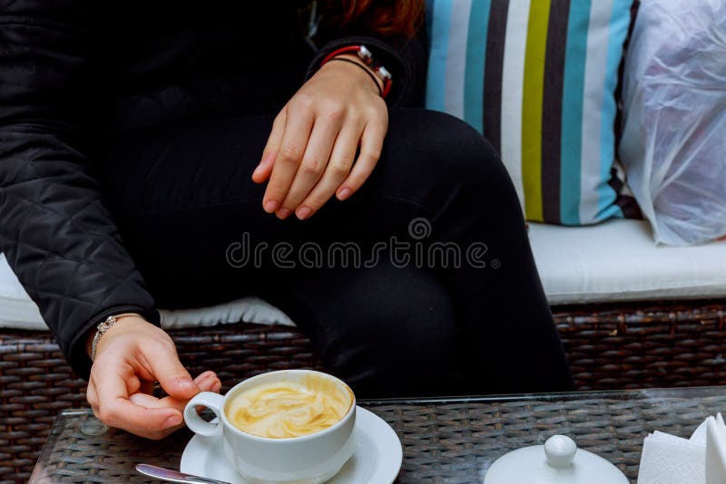 Woman& X27;s Hands Hugging Cup of Coffee in a Restaurant Stock Photo ...