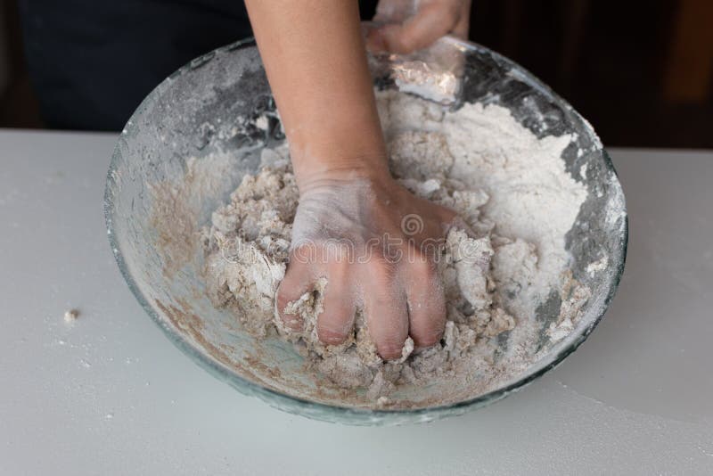 Woman's Hands Kneading Flour Inside Bowl Black Background Stock Photos ...