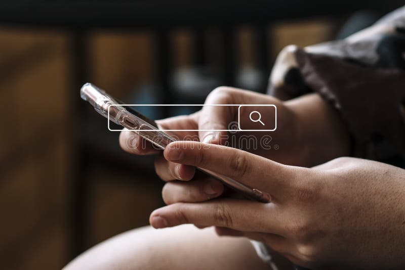 Woman`s Hands Looking at the Phone with Search Bar in the Center of the ...