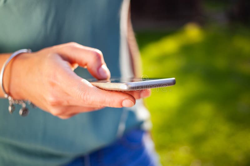 Woman& X27;s Hands Using Smartphone Outdoors - Online Communication ...