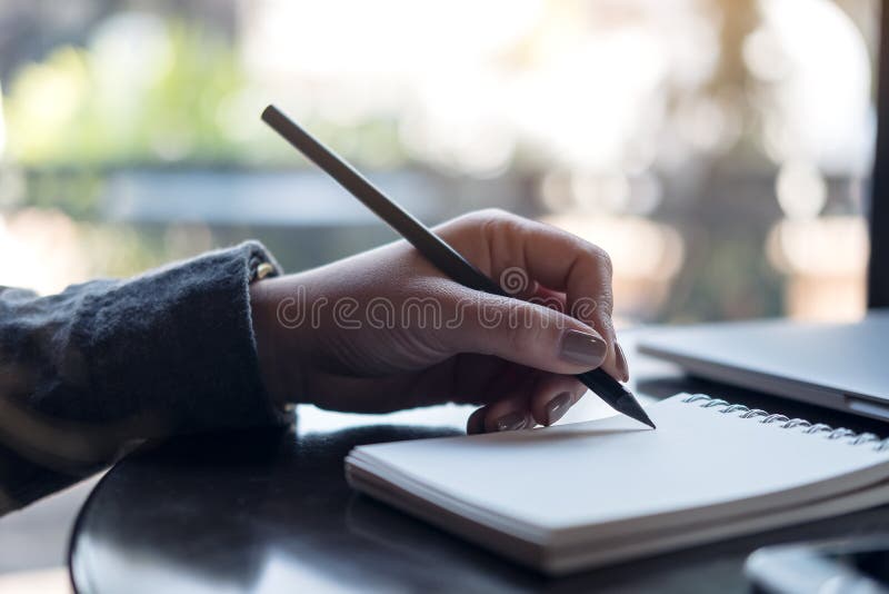 A Woman`s Hands Writing on Notebook on the Table Stock Image - Image of ...