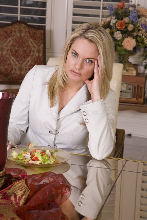 Woman Sad Eating Salad Royalty Free Stock Photos - Image: 13179048