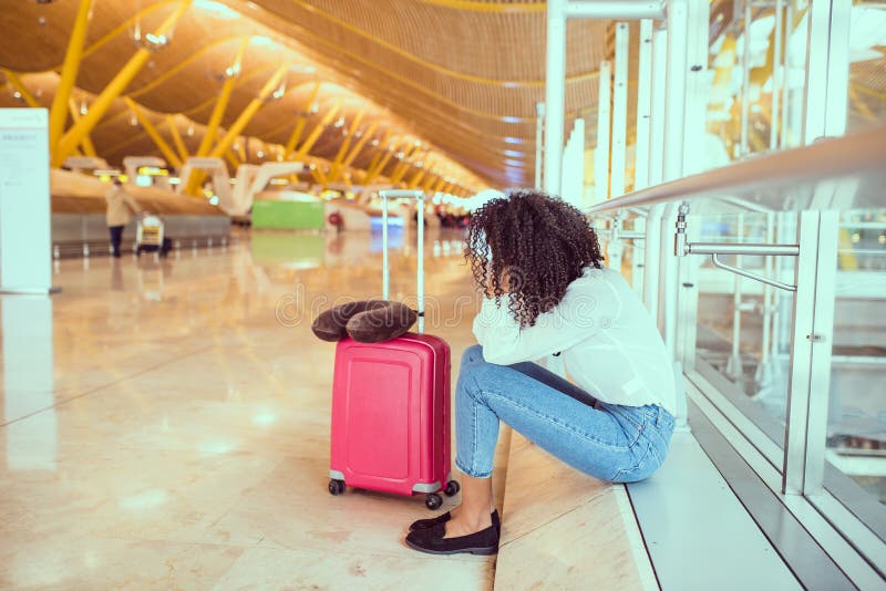 Woman Sad and Unhappy at the Airport with Flight Canceled Stock Image ...