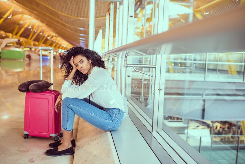 Woman Sad and Unhappy at the Airport with Flight Canceled Stock Image ...