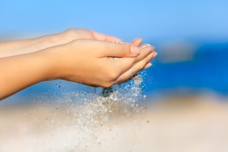 A Woman with Sand Falling through Her Hands Stock Image - Image of ...
