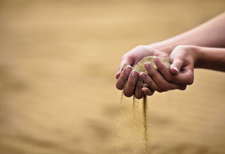Woman with sand in hands stock image. Image of close - 20727719
