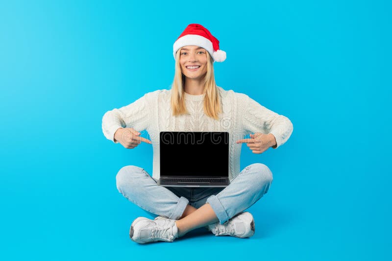 Woman in Santa Hat Sitting on Floor with Laptop Computer Stock Image ...