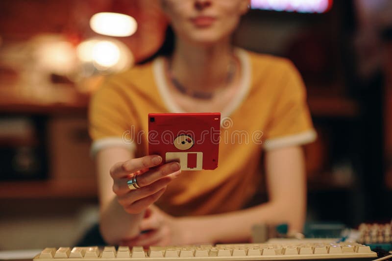 Woman Saving Information on Floppy Disk Stock Photo - Image of ...