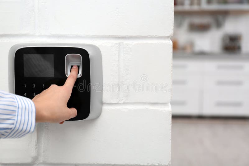 Woman Scanning Fingerprint on Alarm System at Home, Closeup Stock Image ...