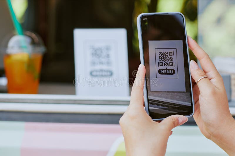 Woman Scanning QR Code stock photo. Image of service - 346627810