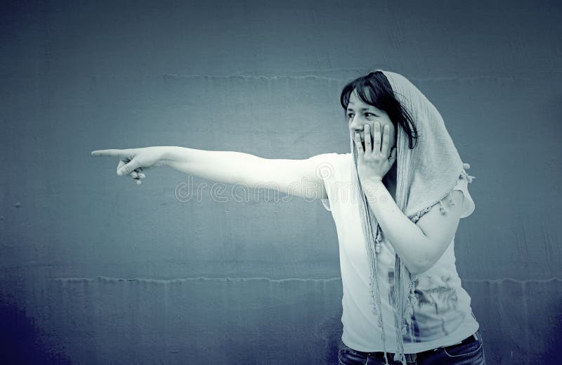 Woman scared points stock image. Image of expression - 83899173