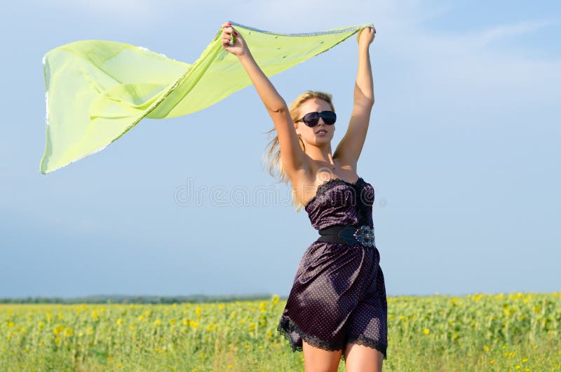 Woman with Scarf Fluttering in the Breeze Stock Image - Image of ...