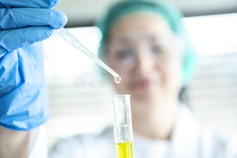 Woman Scholar Dropper and Test Tube Stock Photo - Image of latex ...
