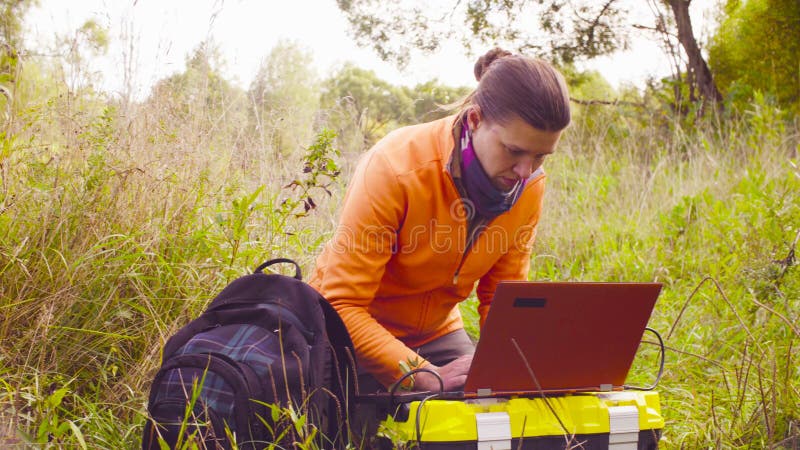 Woman Scientist Ecologist Working on a Laptop Outdoors Stock Photo ...