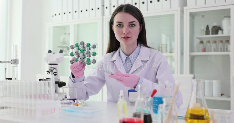 Woman Scientist Holds Model of Molecule Explaining Structure Stock ...