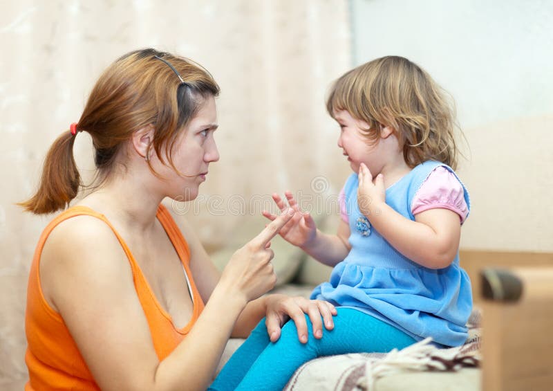 Woman scolds crying child stock image. Image of inveigh - 44774443