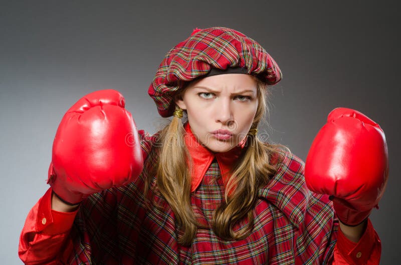 The Woman in Scottish Clothing in Boxing Concept Stock Photo - Image of ...