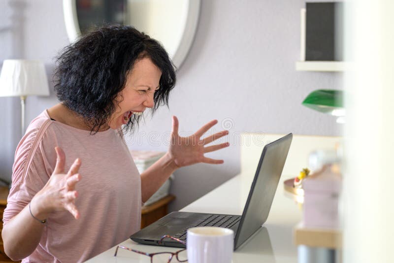 Woman Screaming in Front of Her Computer Stock Image - Image of ...