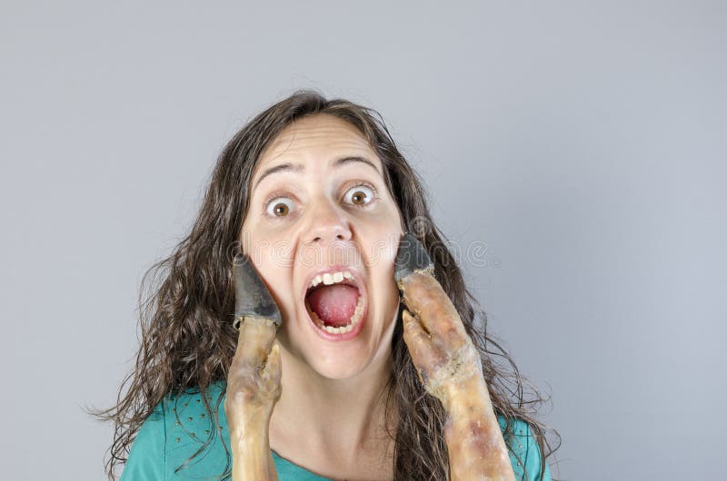 Woman Screaming with Ham Leg in Her Face. Stock Photo - Image of girl ...