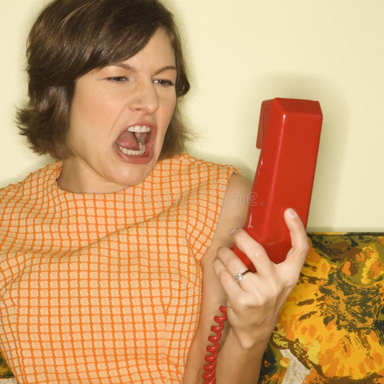 Woman screaming at phone. stock image. Image of colour - 2431353