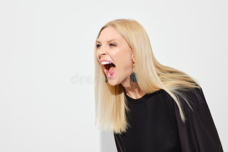 Woman Screams in Irritation Leaning Forward Stock Photo - Image of ...