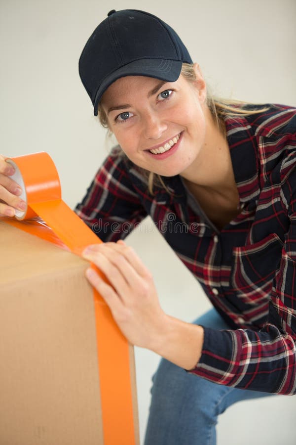 Woman Sealing Cardboard Box with Adhesive Tape Stock Image - Image of ...