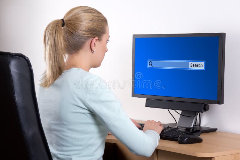 Woman Searching Something in Internet with Personal Computer in Stock ...