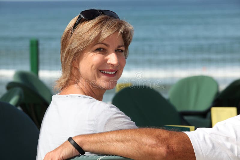 Woman in seaside cafe stock image. Image of caucasian - 27089111