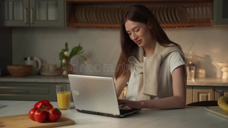 Woman Sitting at Table Using Laptop Stock Video - Video of female ...