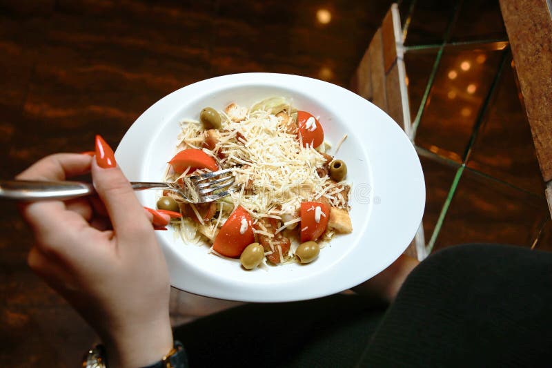 Woman Eating Bowl of Food with Fork Stock Image - Image of room, fork ...