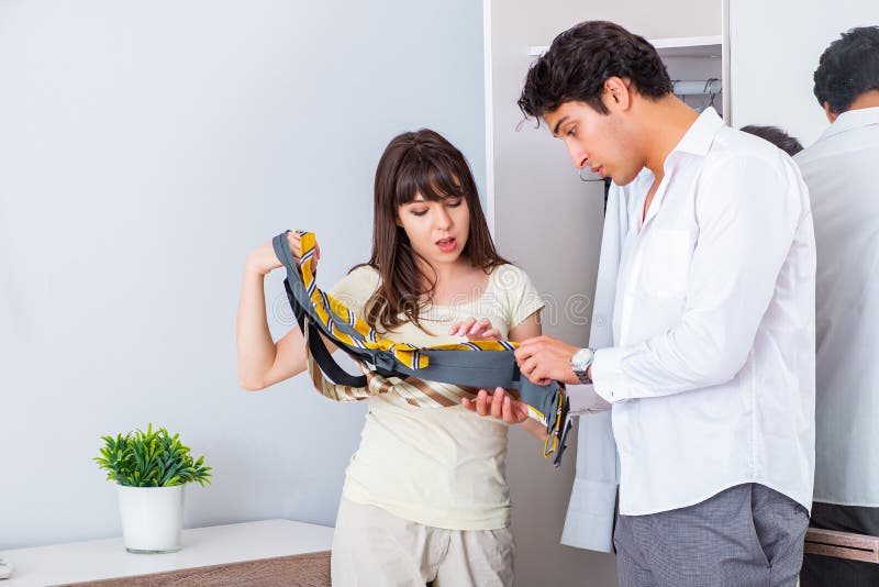 The Woman Sees Her Husband Off To Work Stock Image - Image of clothes ...