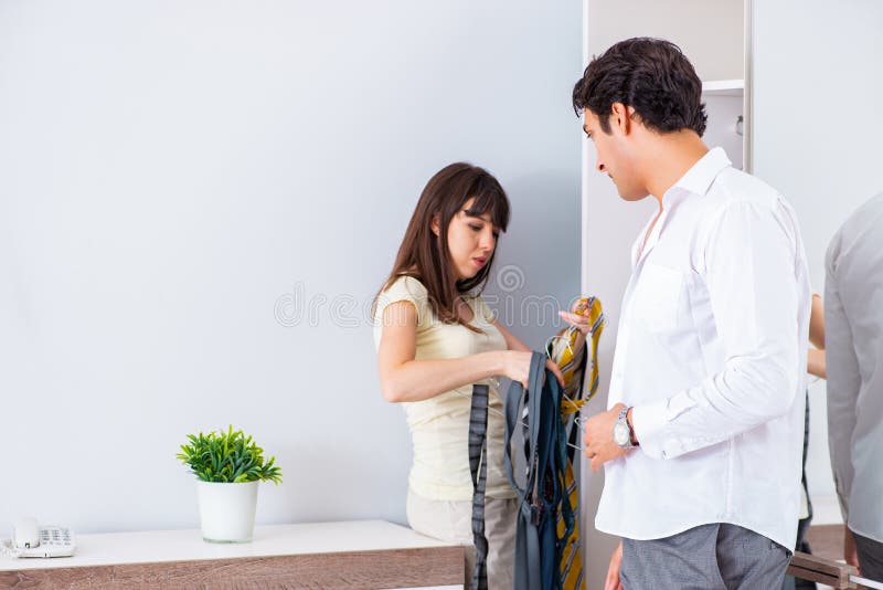 The Woman Sees Her Husband Off To Work Stock Image - Image of collar ...