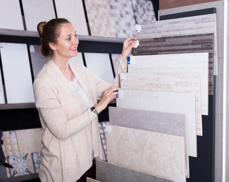 Woman Selecting Kitchen Tile Stock Photo - Image of consumerism, casual ...