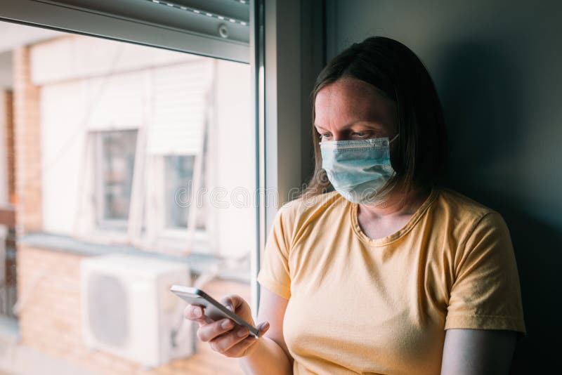 Woman in Self-isolation during Virus Outbreak Using Mobile Phone Stock ...