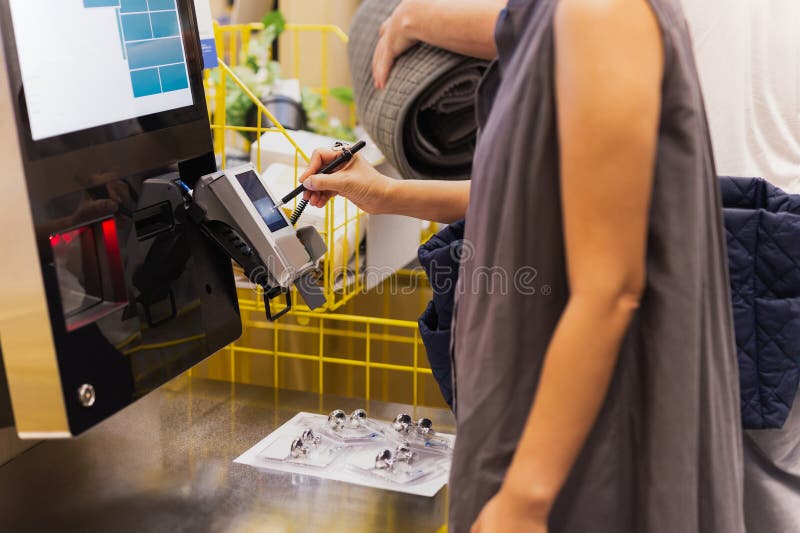 Woman Self Payment at the Sef Service Counter of the Customer Card ...