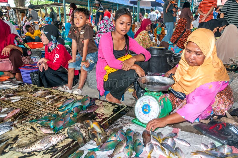 Woman Selling Fish editorial stock photo. Image of work - 33830913