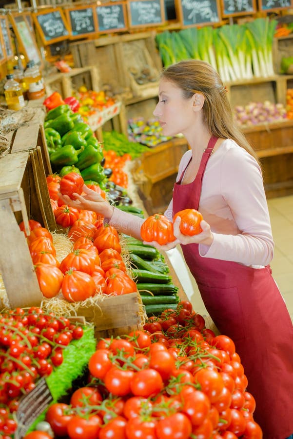Woman selling vegetables stock photo. Image of tomatoes - 172603178