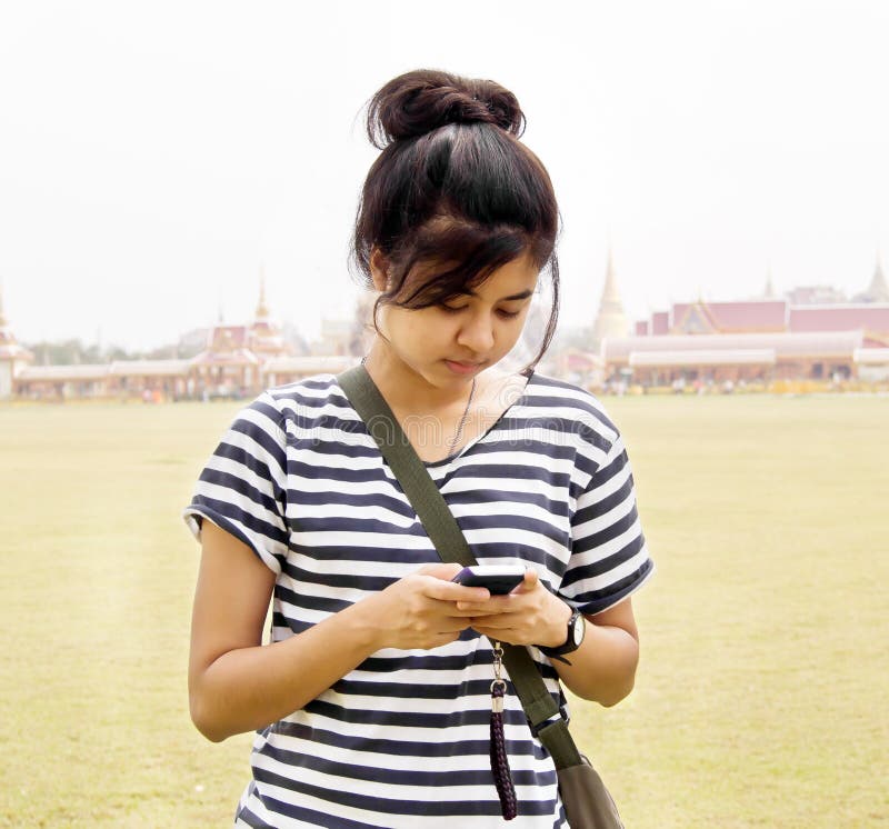 Woman Sending / Receiving a Text Message Stock Image - Image of finger ...