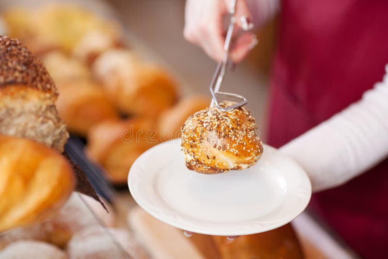 Woman Serving Bread Roll Speciality Stock Photo - Image of glass ...