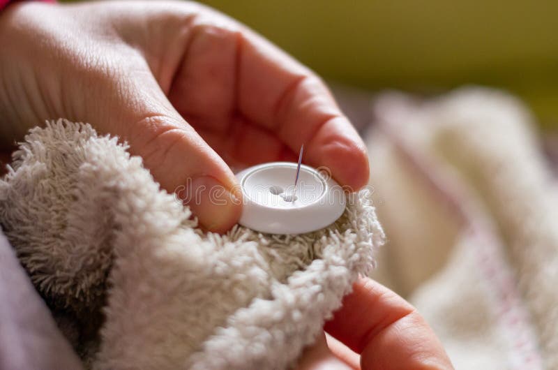 Woman Sewing a Button with Thread and Needle Stock Photo - Image of ...