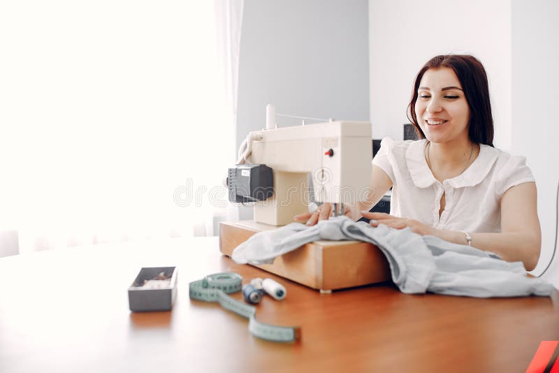 Woman Sewing on a Sewing Machine Stock Photo - Image of professional ...